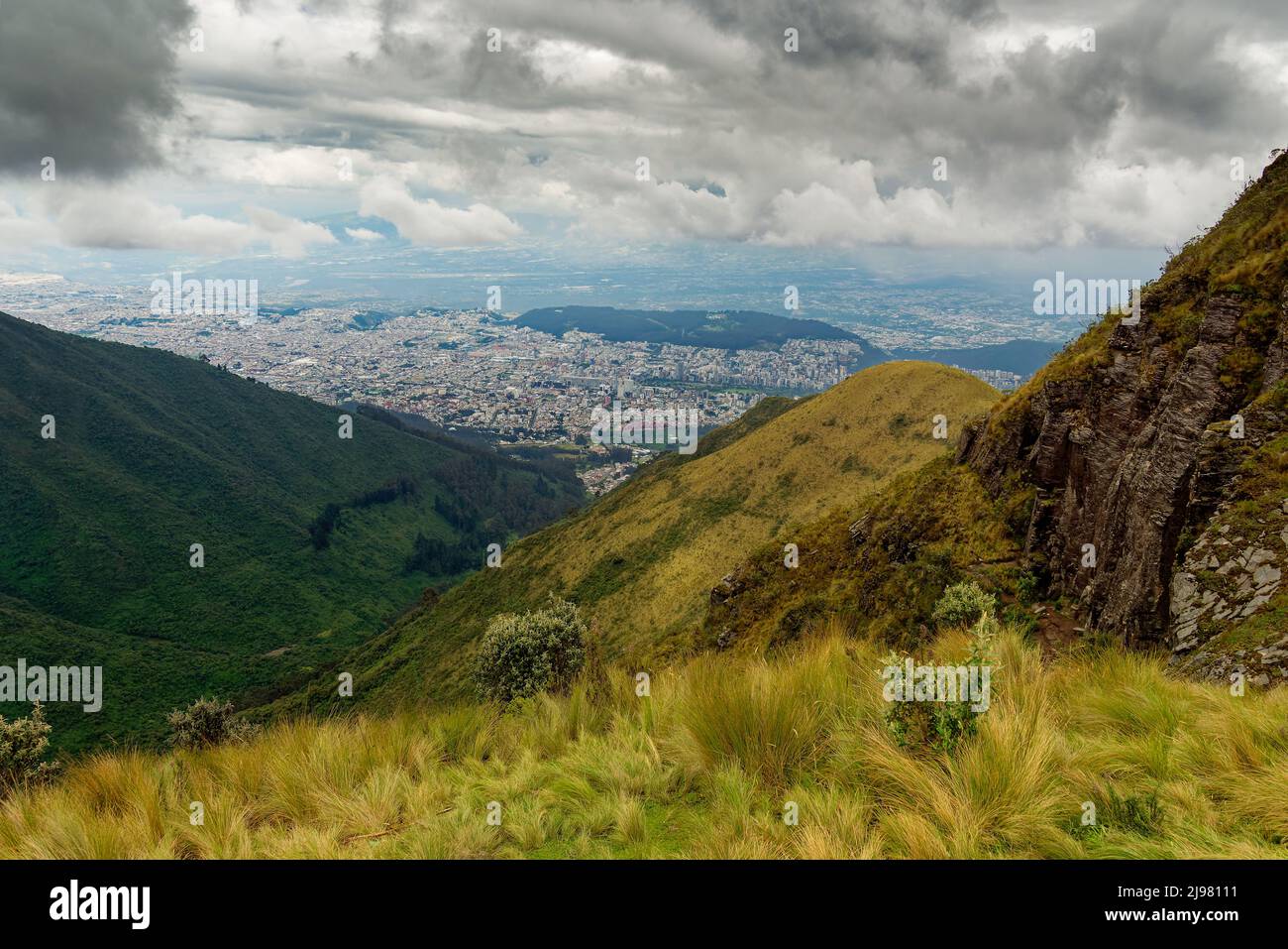 Landscape view to Quito from the peak Pichincha Volcano. High mountains ...