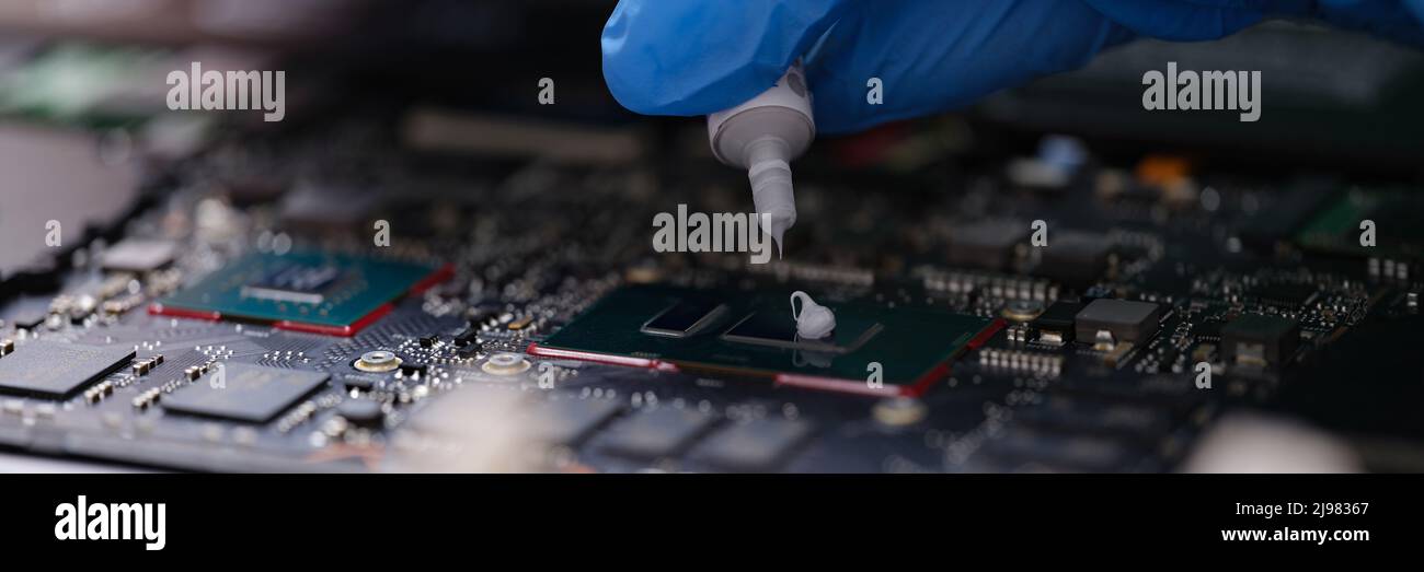 Thermal paste for processor, computer repair Stock Photo - Alamy