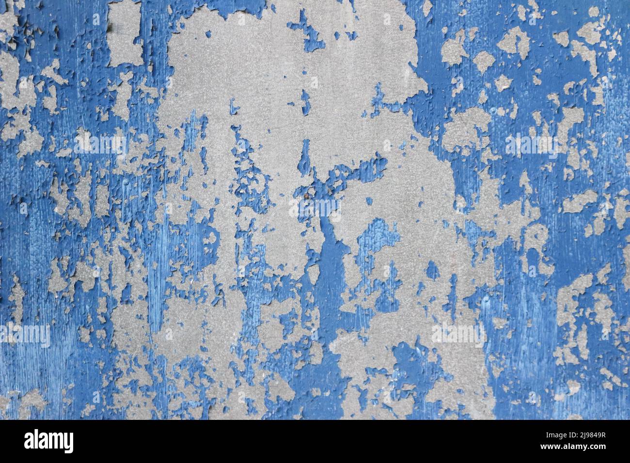 Old Damaged metallic Surface with Peeling Paint Pieces Stock Photo - Alamy