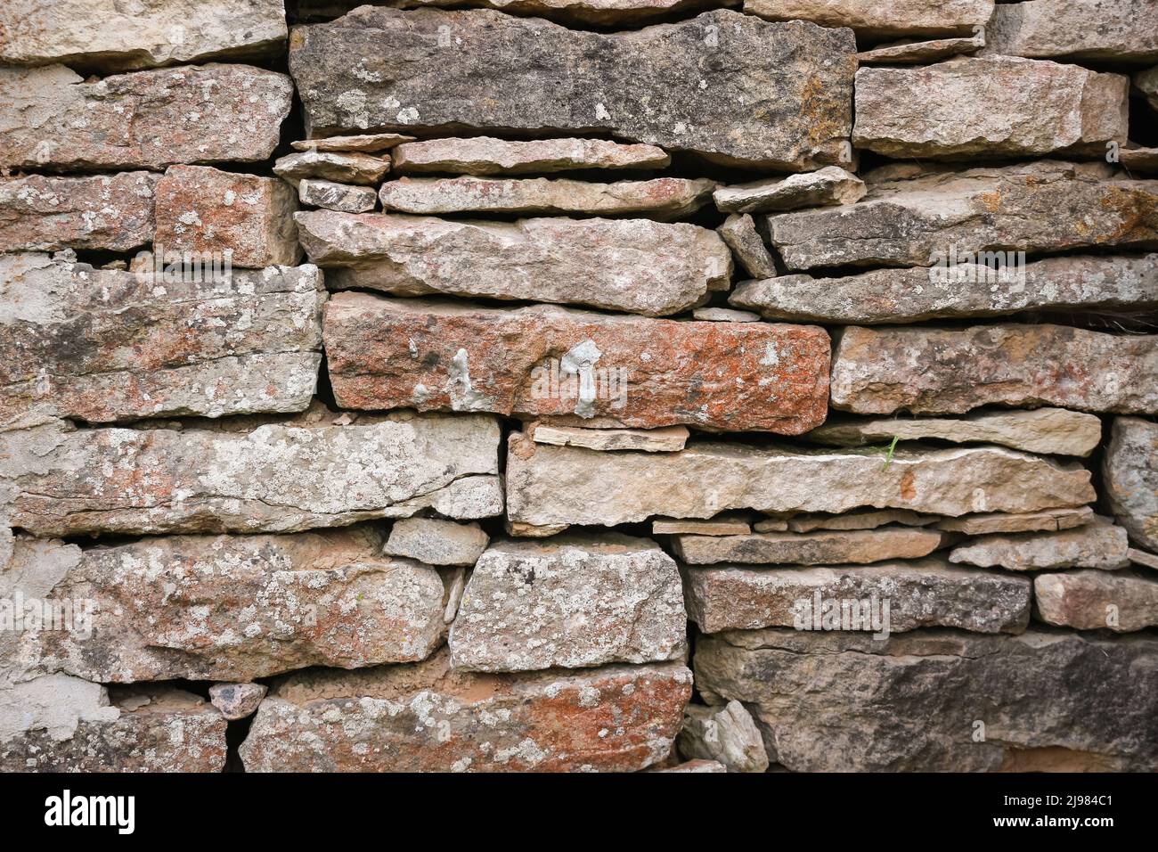 Old stone wall texture background. The stone wall texture background ...