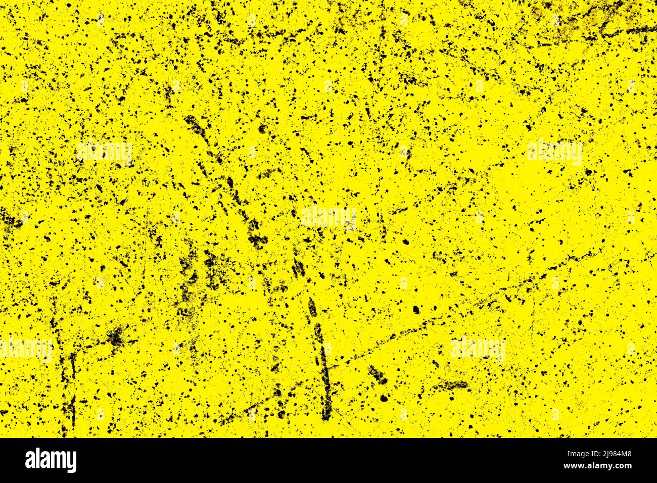 Scattered stains and grunge texture on a rustic old yellow background ...
