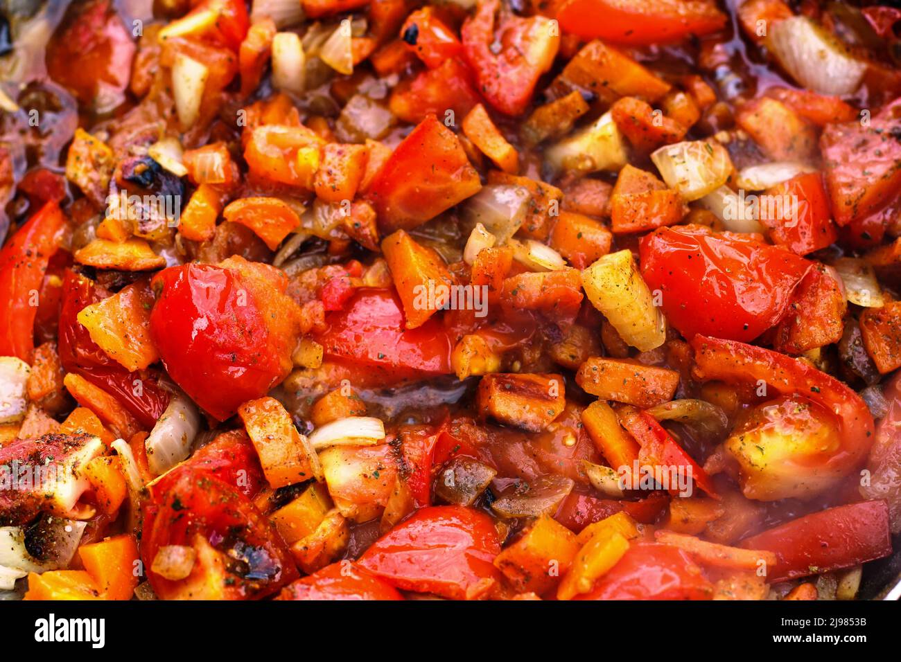 Close up of fried vegetables food background Stock Photo - Alamy