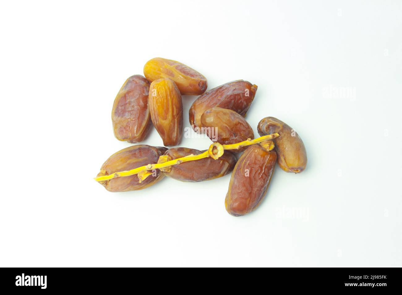 Tasty dry dates are isolated on white background. Arabic food Stock ...