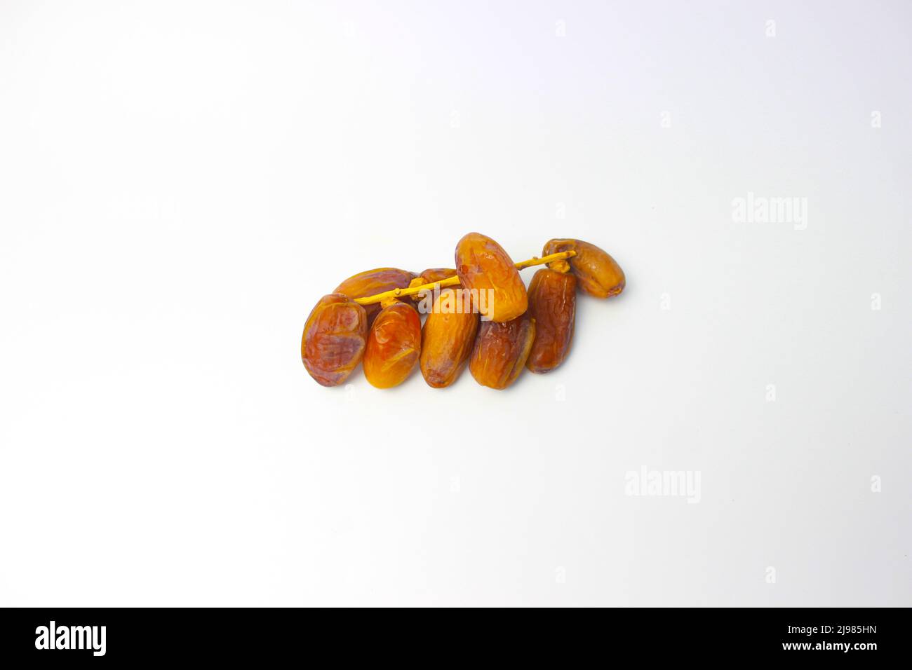 Tasty dry dates are isolated on white background. Arabic food Stock ...
