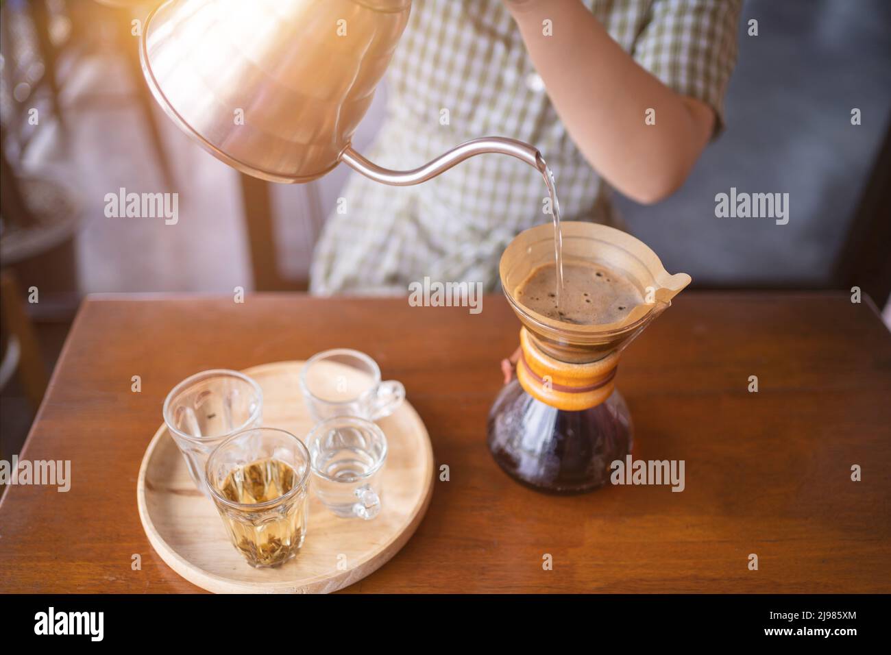 drip coffee. hot arabica coffee brew hand making process by ...