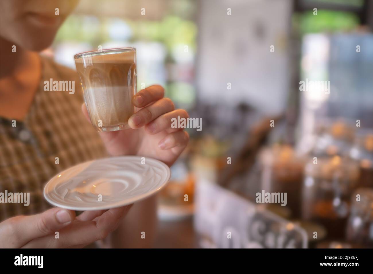 Beautiful speculoos latte with milk in a glass ,cafe background Stock ...