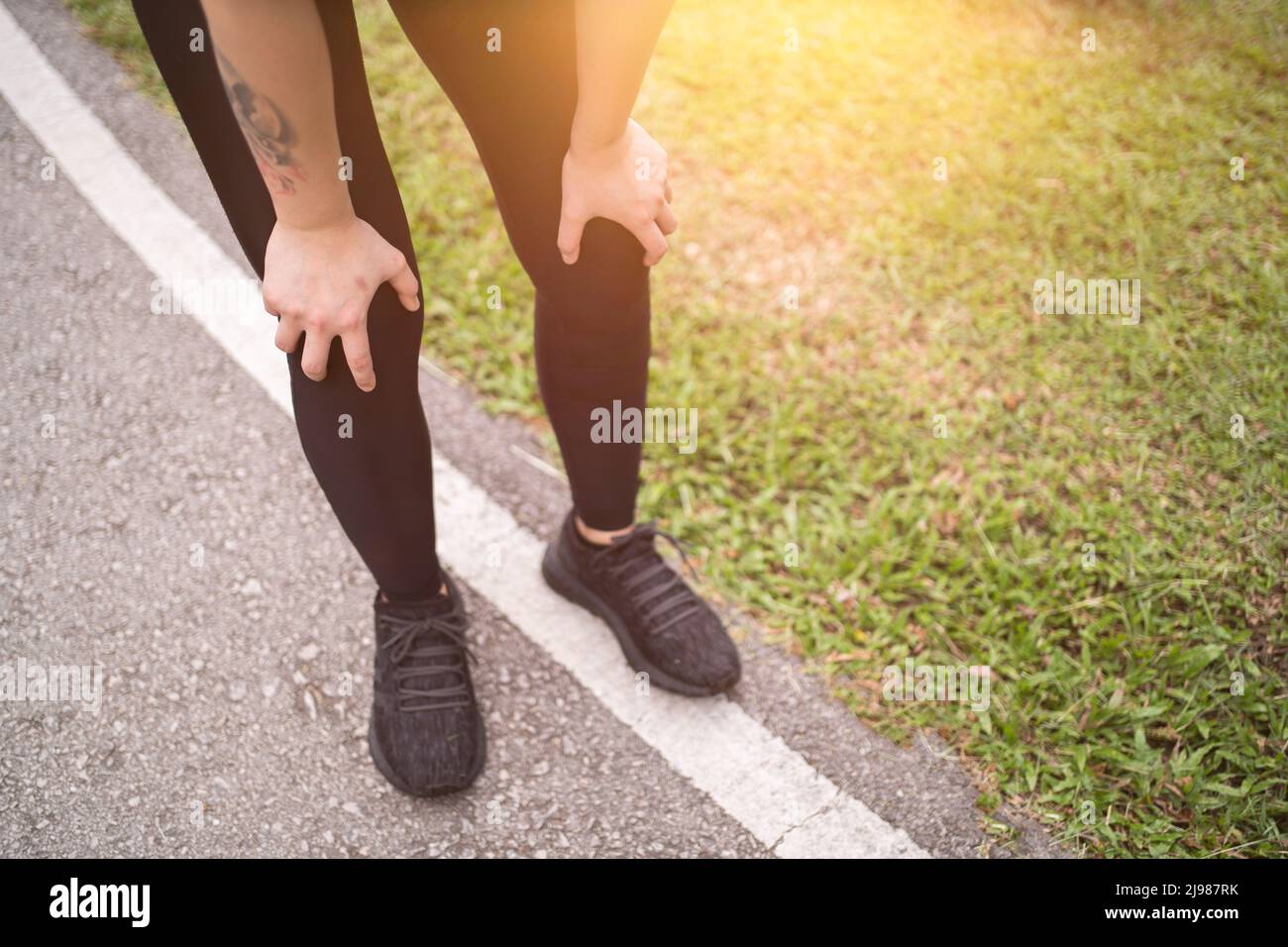 Asian female runner rest hi-res stock photography and images - Alamy