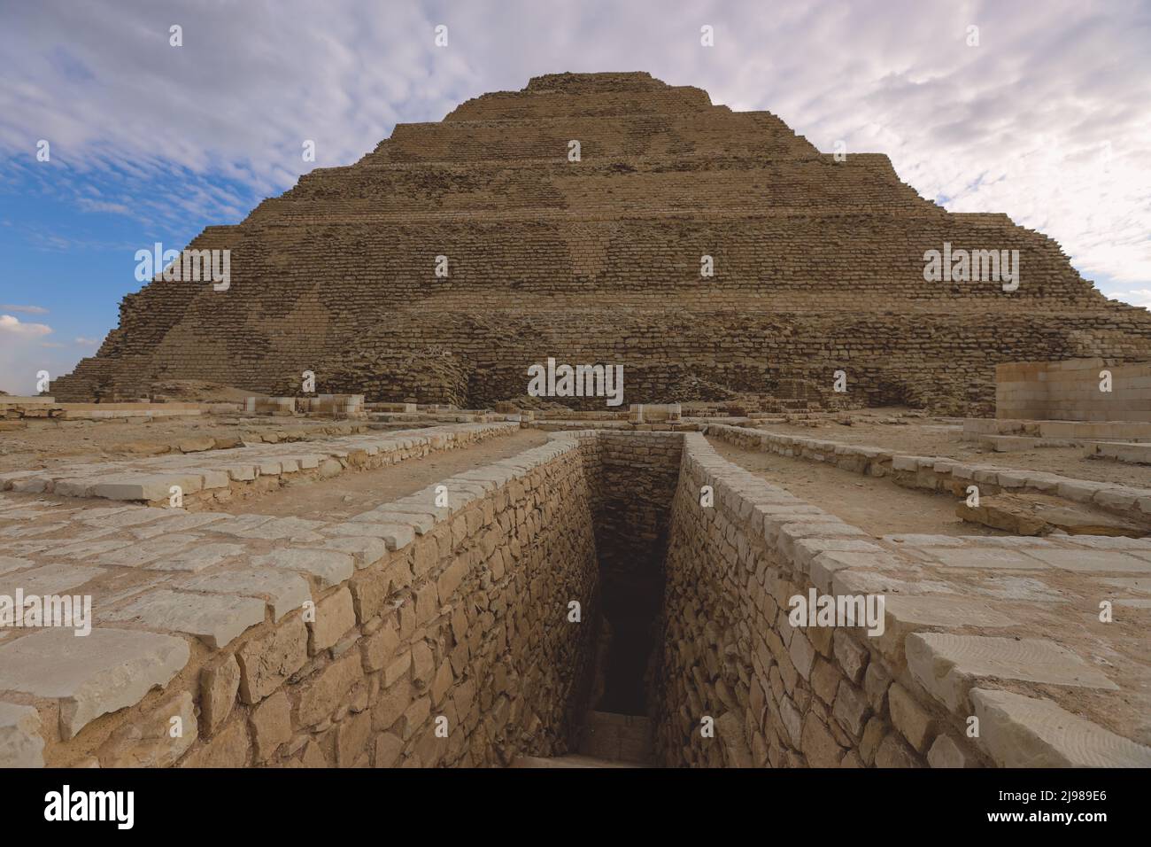Majestic View to the Step Pyramid of Djoser under blue sky, is an ...