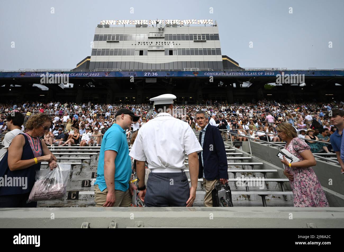 New York, USA. 21st May, 2022. A cadet stands guard as friends and ...