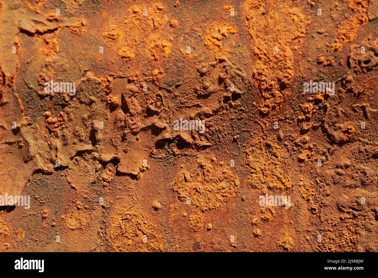 Embossed old ragged rusty metal surface, grunge background Stock Photo ...