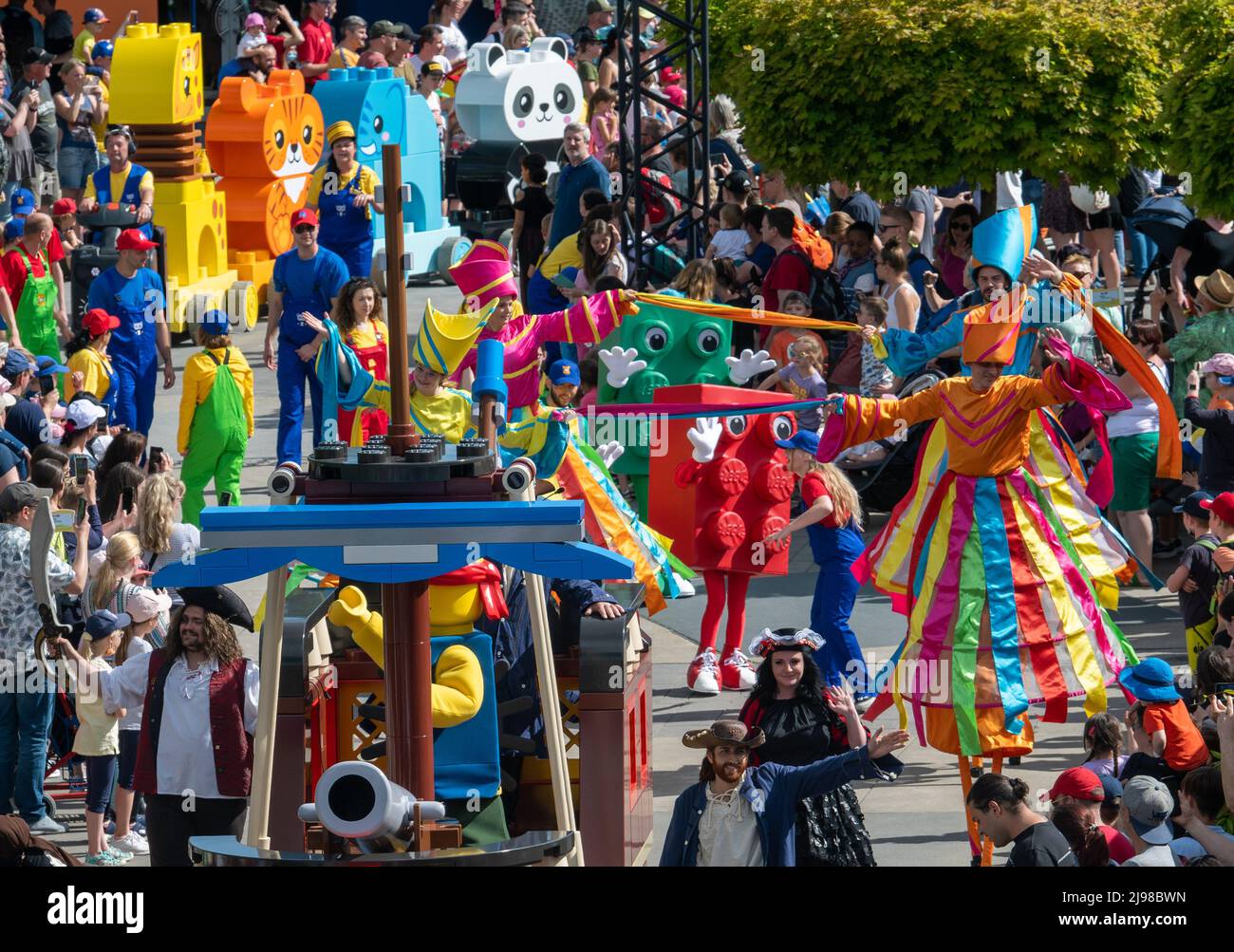 21 May 2022, Bavaria, Günzburg: A colorful parade moves through the ...