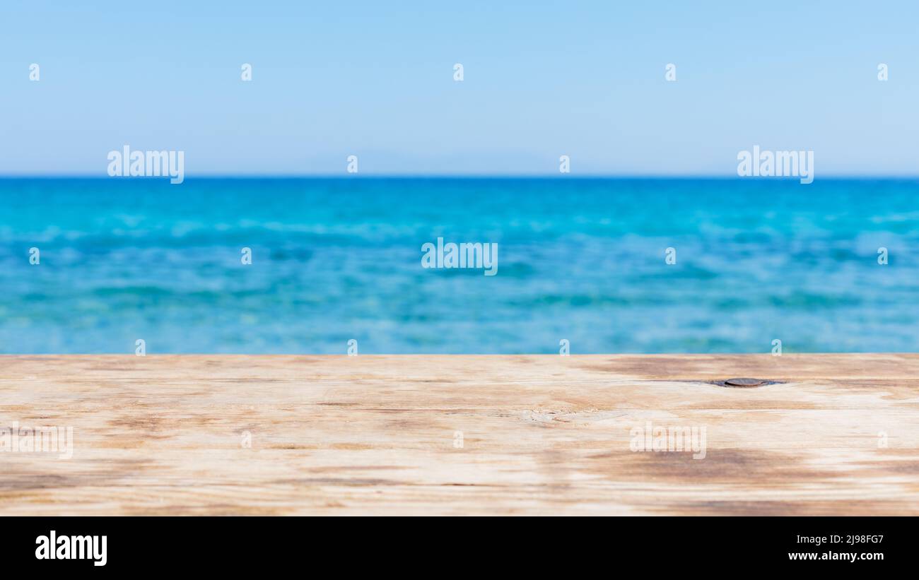 Wood table top on blur summer blue sea. Empty wooden table on the ...
