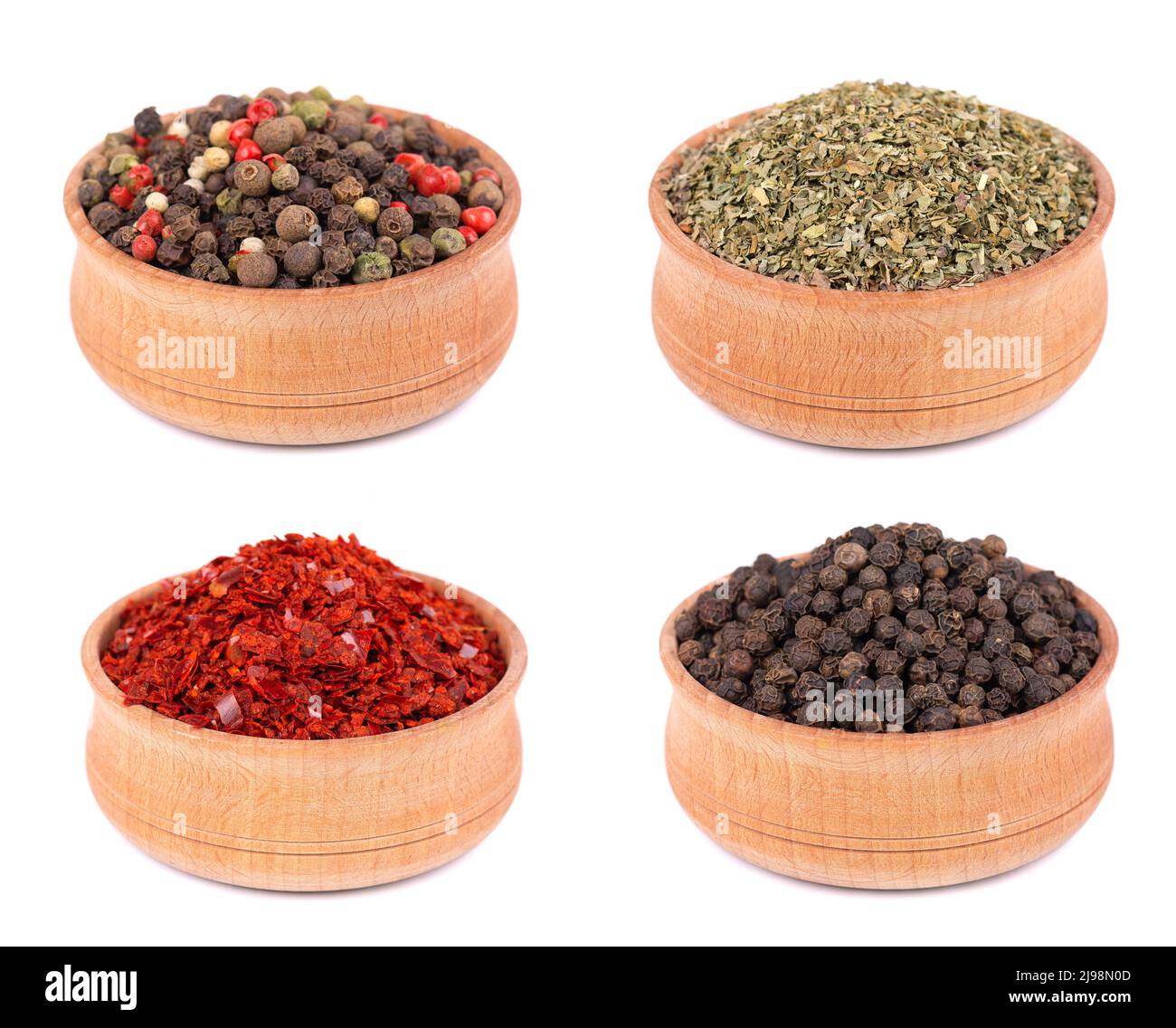 Mix of spices and seasonings isolated in wooden bowl, isolated on white ...