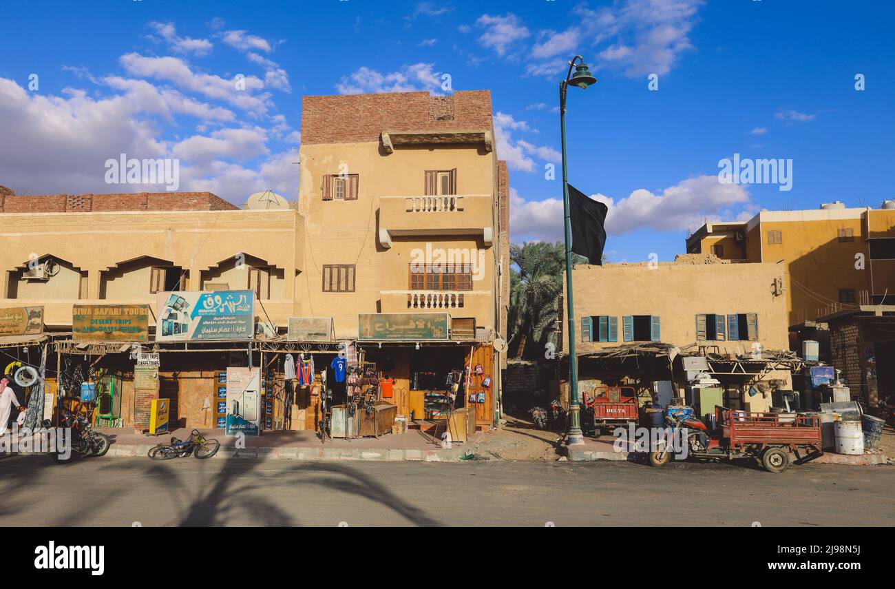 Cityscape View with Old Cars, Local People and Buildings in the Siwa ...