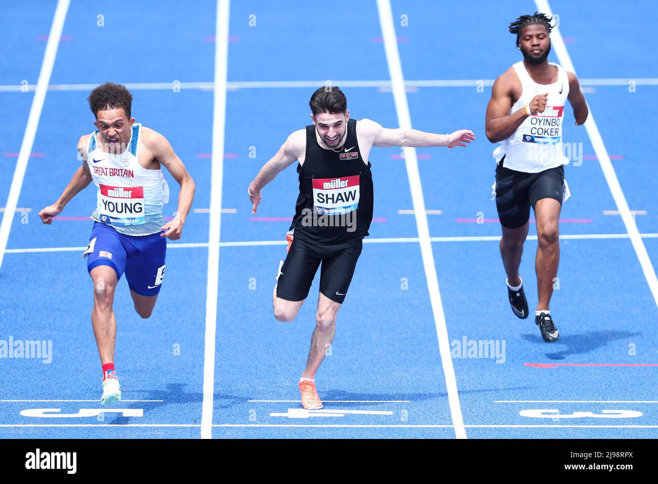 Great Britain’s Thomas Young (left) wins the 100m Ambulant Men with a ...