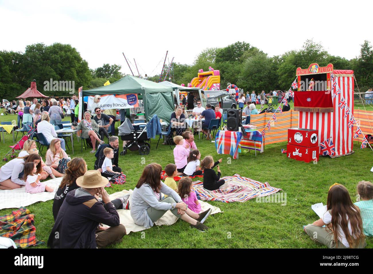 Walton on the Hill, Surrey, UK. 21st May, 2022. Youngsters enthralled ...