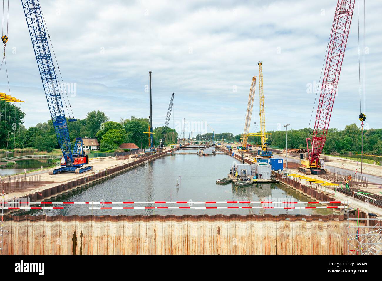 Construction of roads where a canal is filled in to make way for a ...