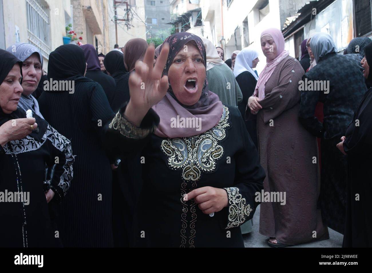 Relatives of 17-year-old Palestinian Amjad Al-Fayed mourn during his ...