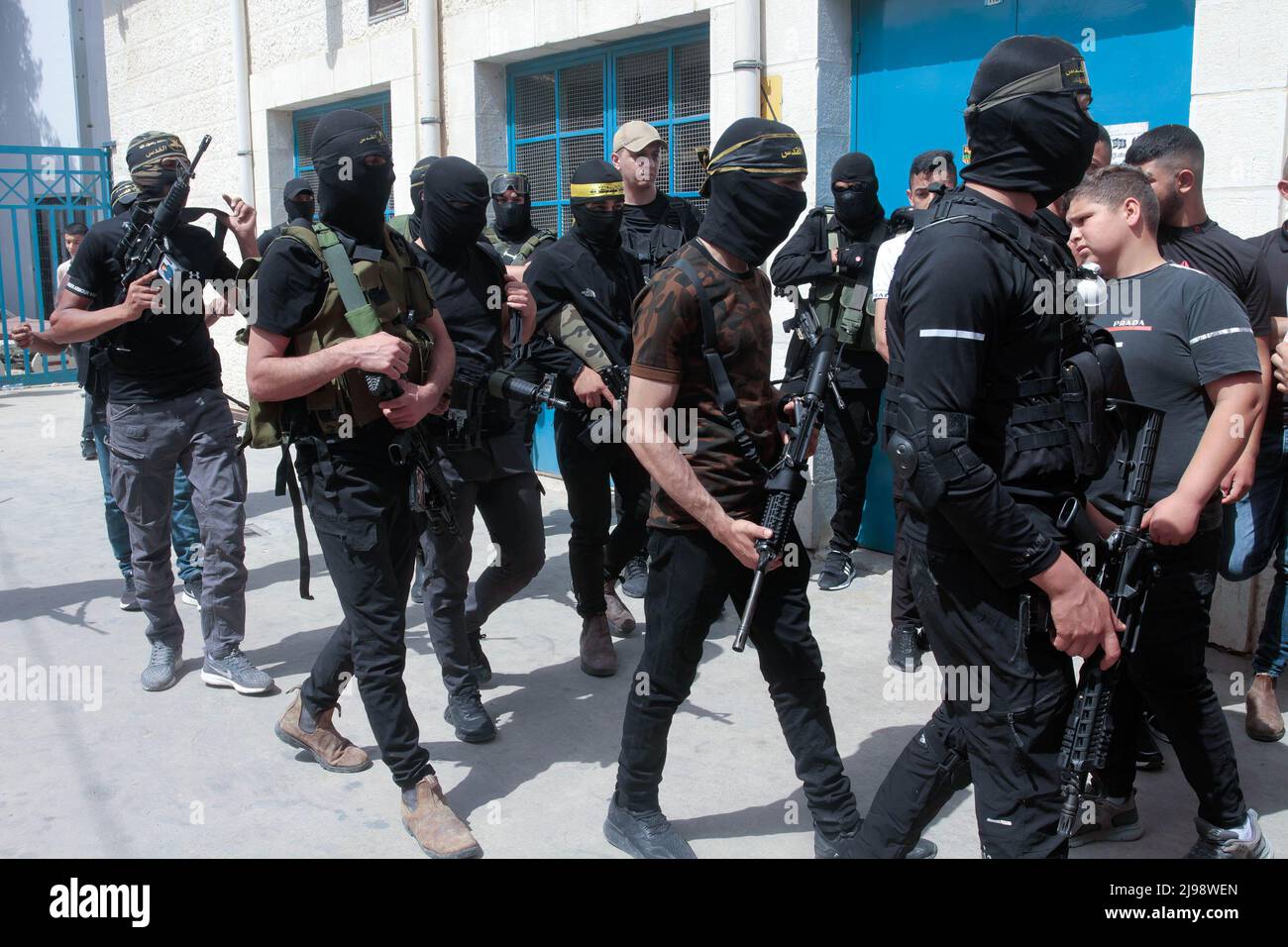 Gunmen from the Islamic Jihad movement participate in the funeral of ...
