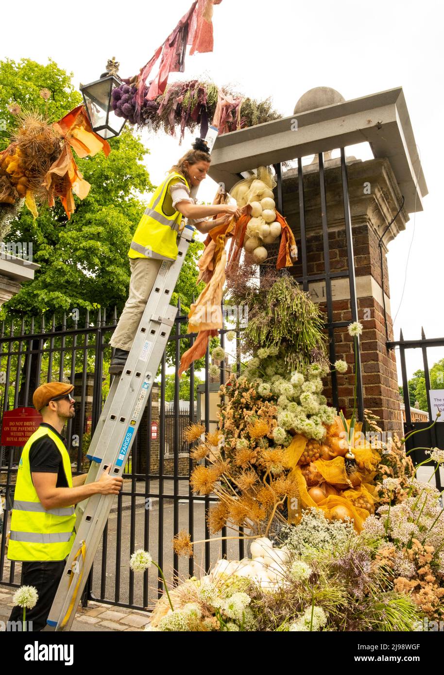 An onion themed display being assembled around the entrance to the RHS ...