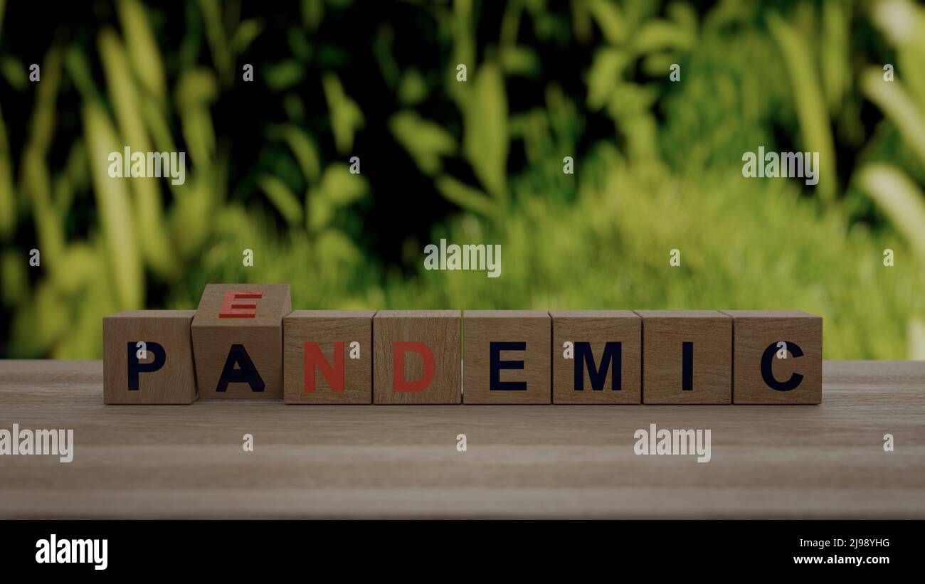 Covid-19 pandemic or endemic symbol. Turned wooden cubes and changed ...