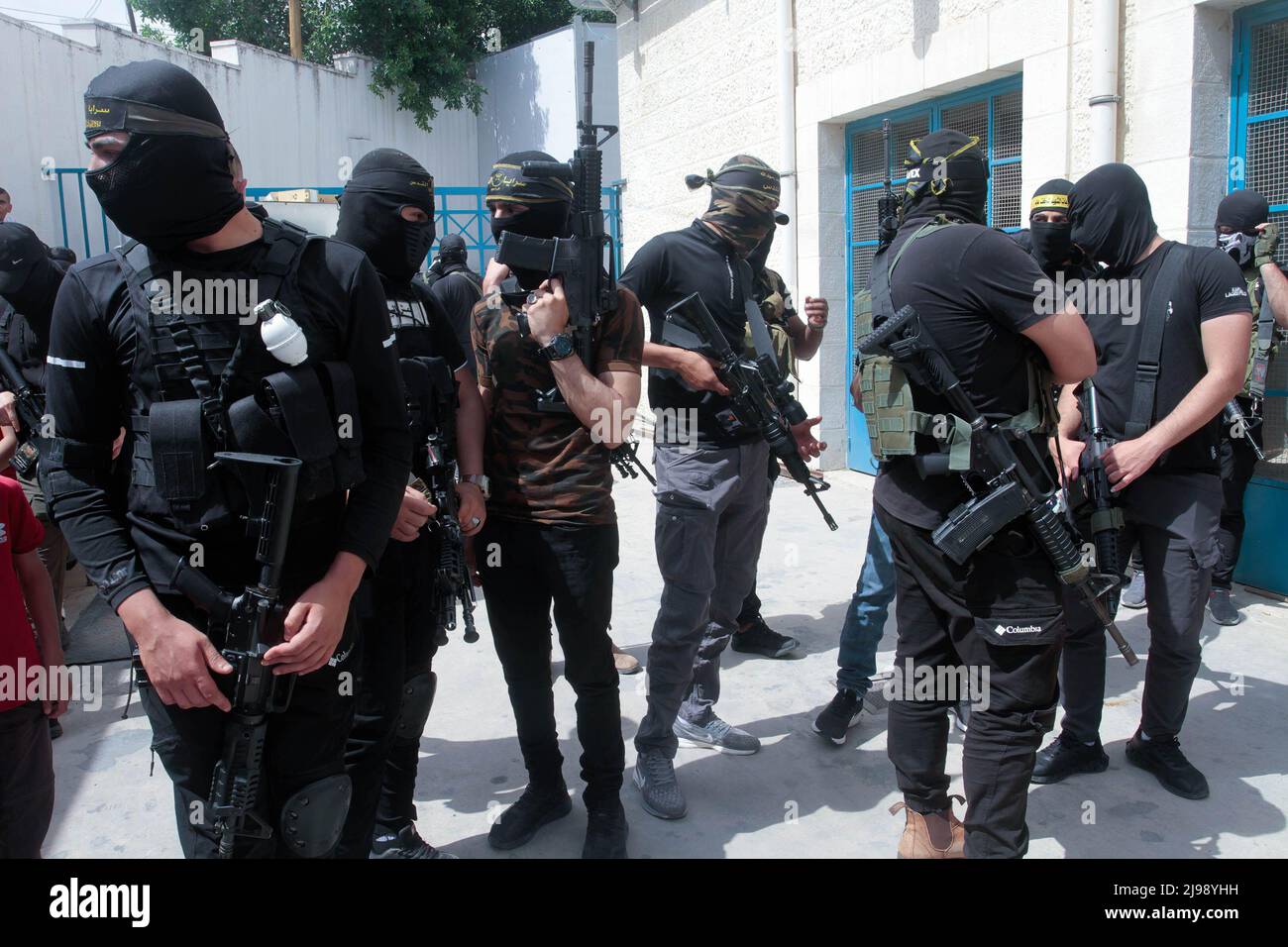 Gunmen from the Islamic Jihad movement participate in the funeral of ...