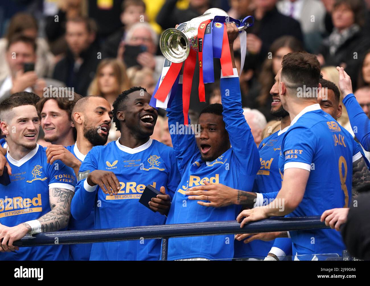 Rangers' Amad Diallo lifts the trophy following the Scottish Cup final ...