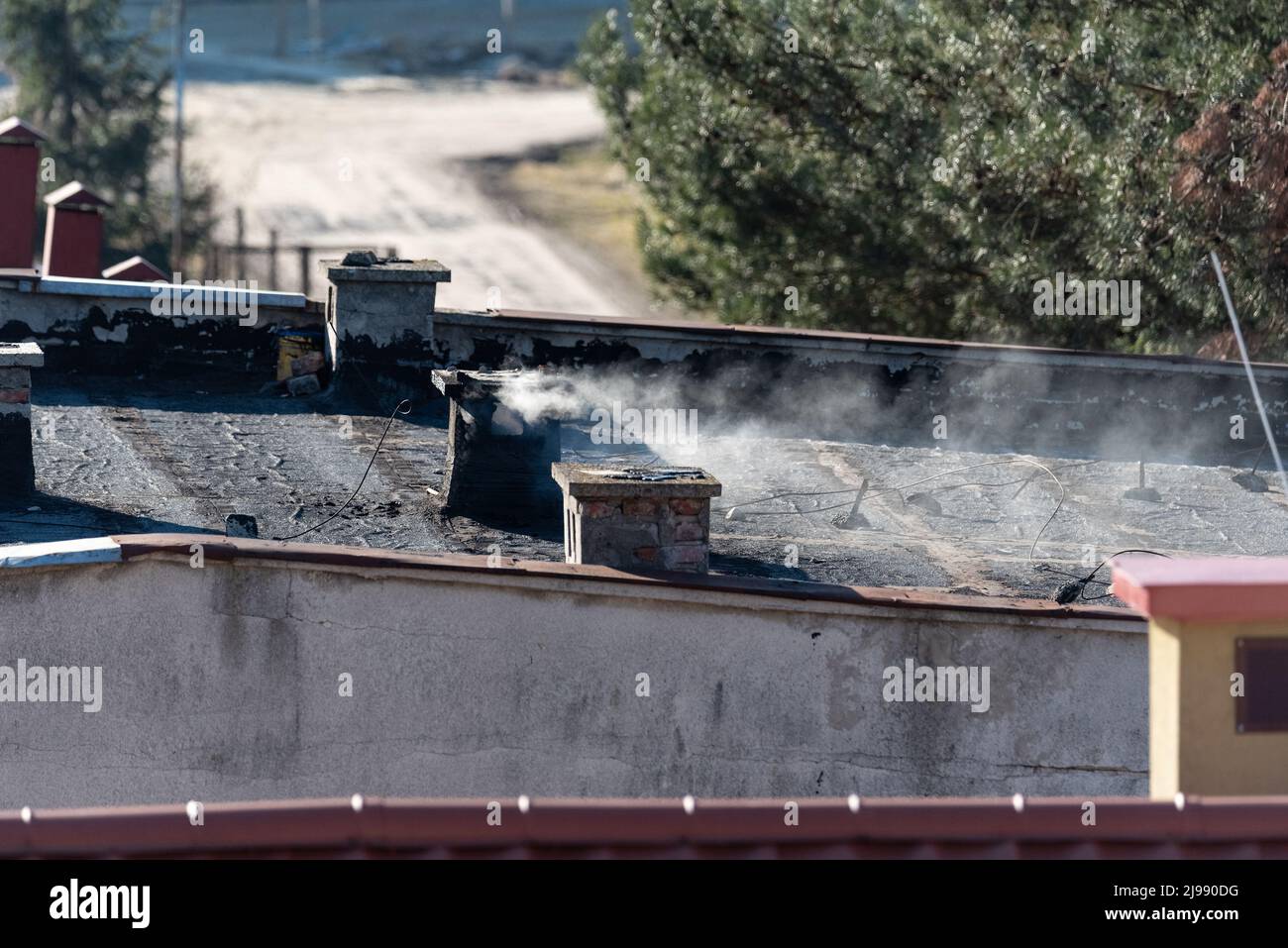 Chimney on the roof of the building. Vent and smoke chimney, smoke ...