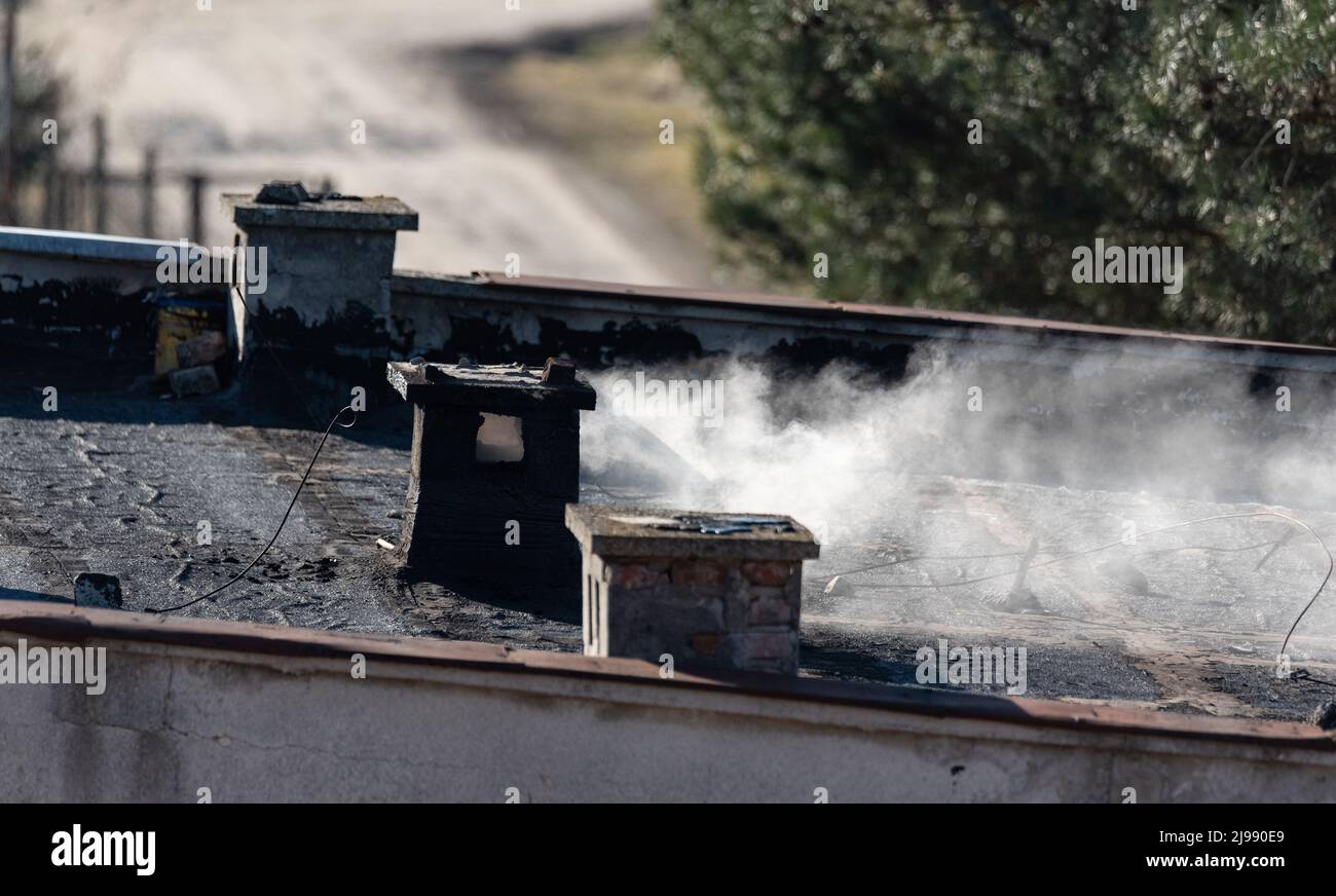 Chimney on the roof of the building. Vent and smoke chimney, smoke ...