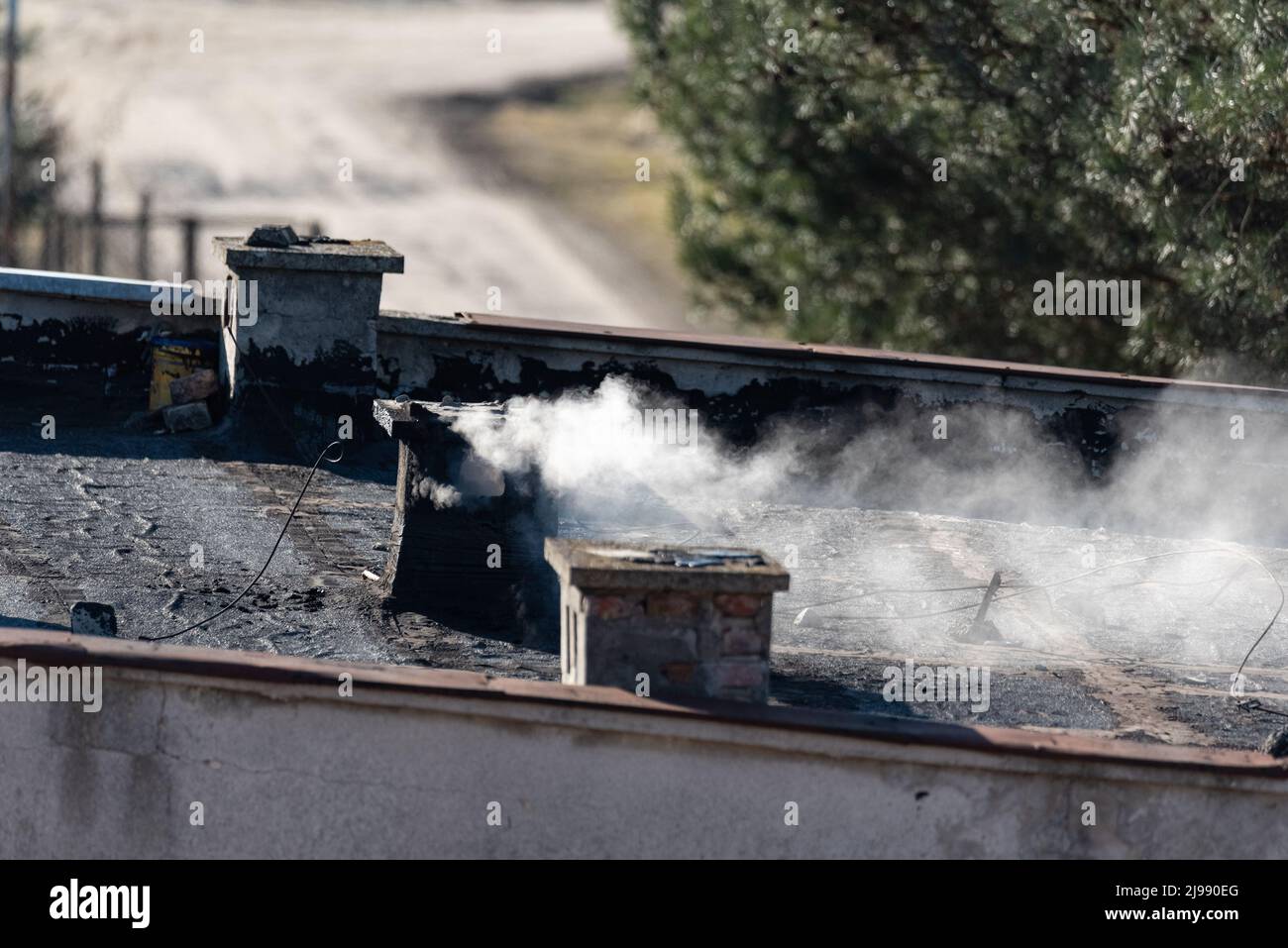 Chimney on the roof of the building. Vent and smoke chimney, smoke ...
