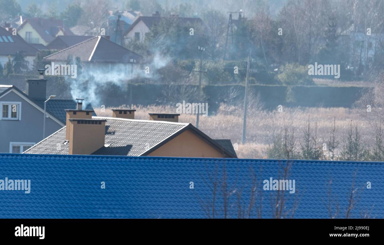 Chimney on the roof of the building. Vent and smoke chimney, smoke ...
