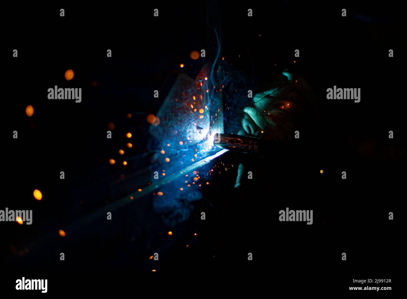 Metal welding. Fire from operation of welding machine. Manufacture of ...