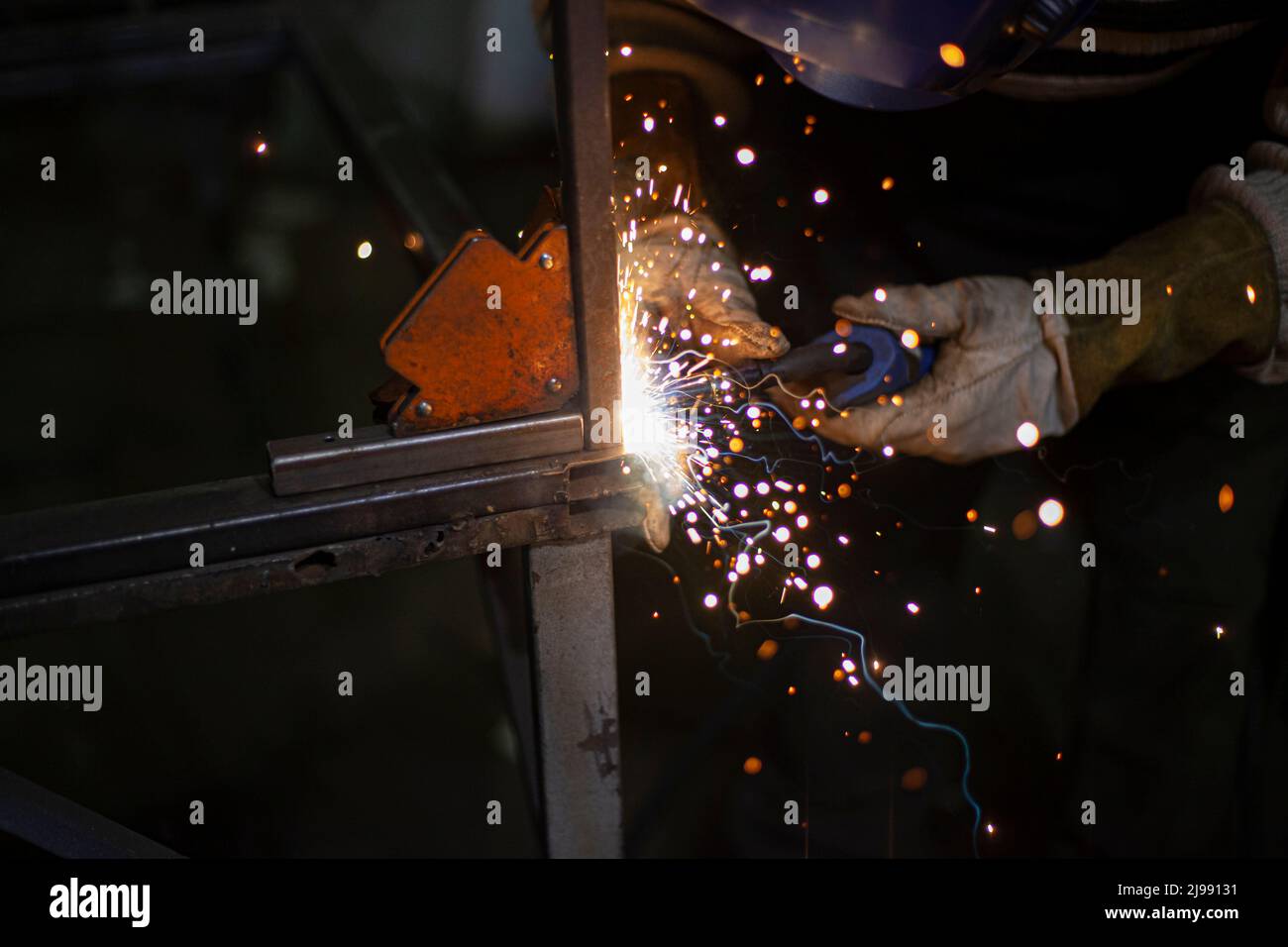 Metal welding. Fire from operation of welding machine. Manufacture of ...