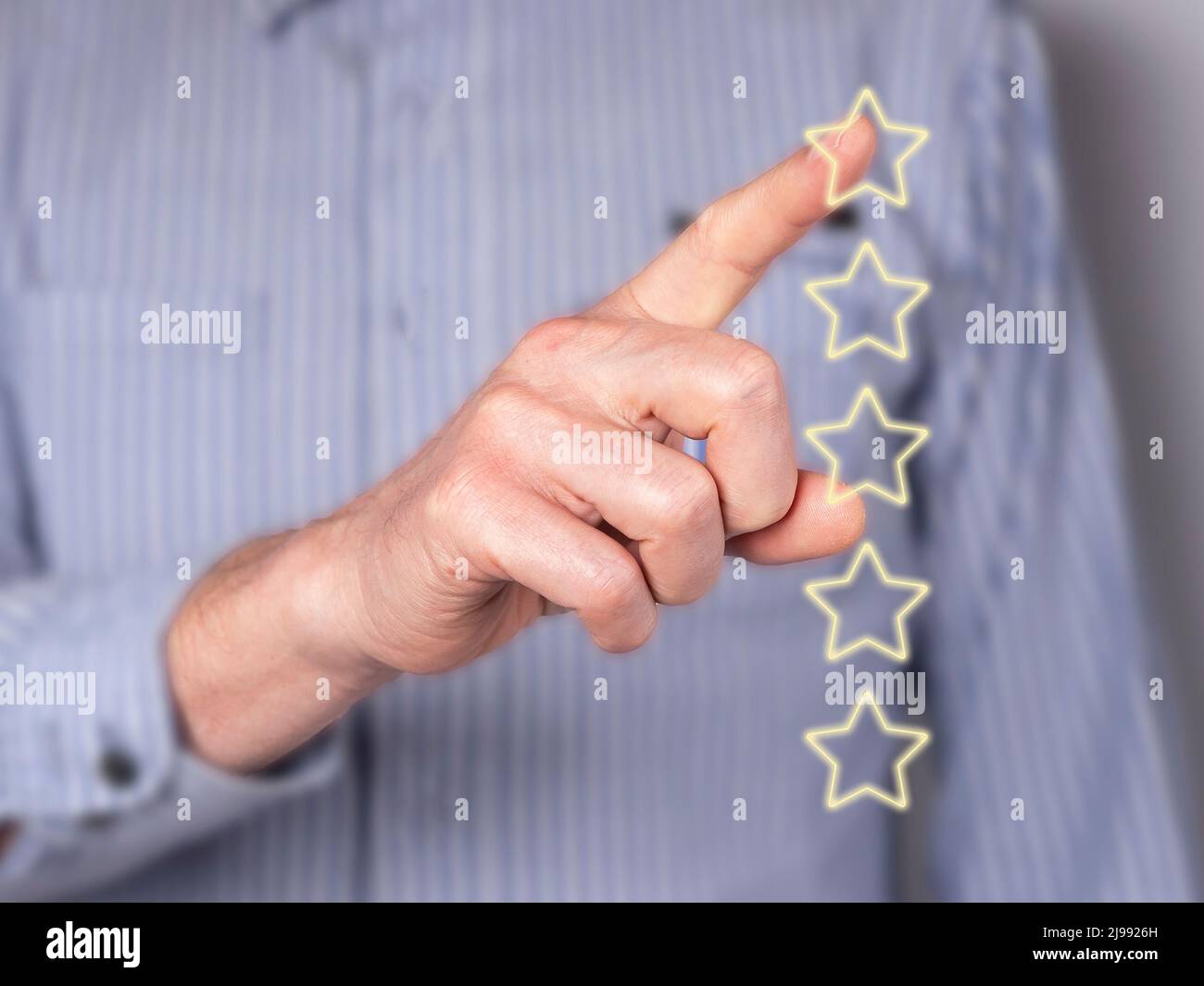 Man hand giving feedback. Star rating of service quality at virtual ...