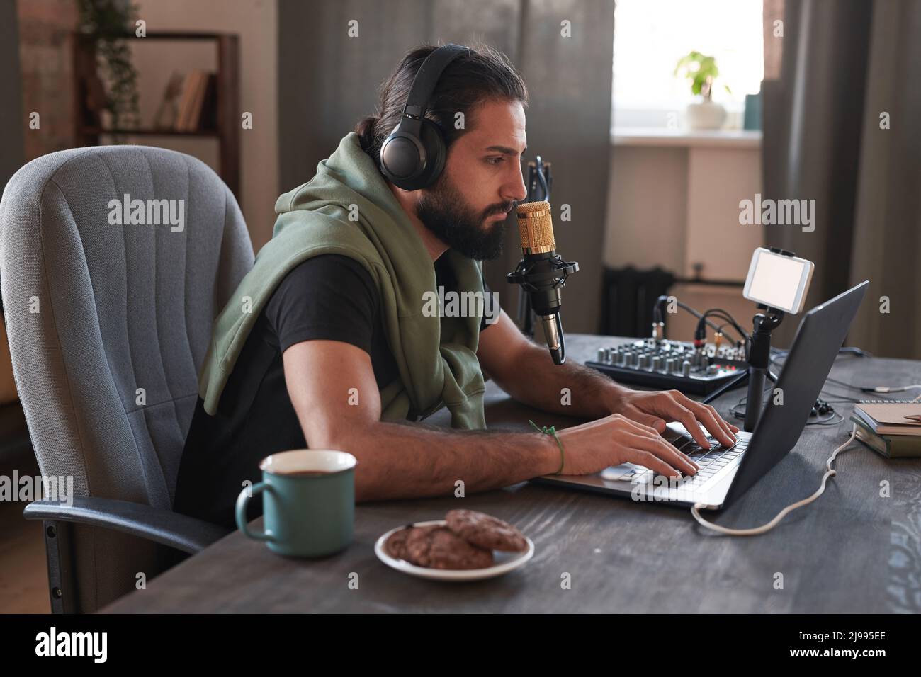 Horizontal medium side view portrait of modern Middle Eastern male ...
