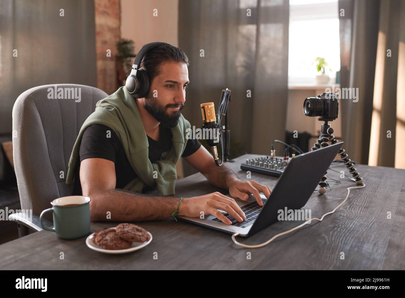 Horizontal medium portrait of modern bearded young Middle Eastern ...