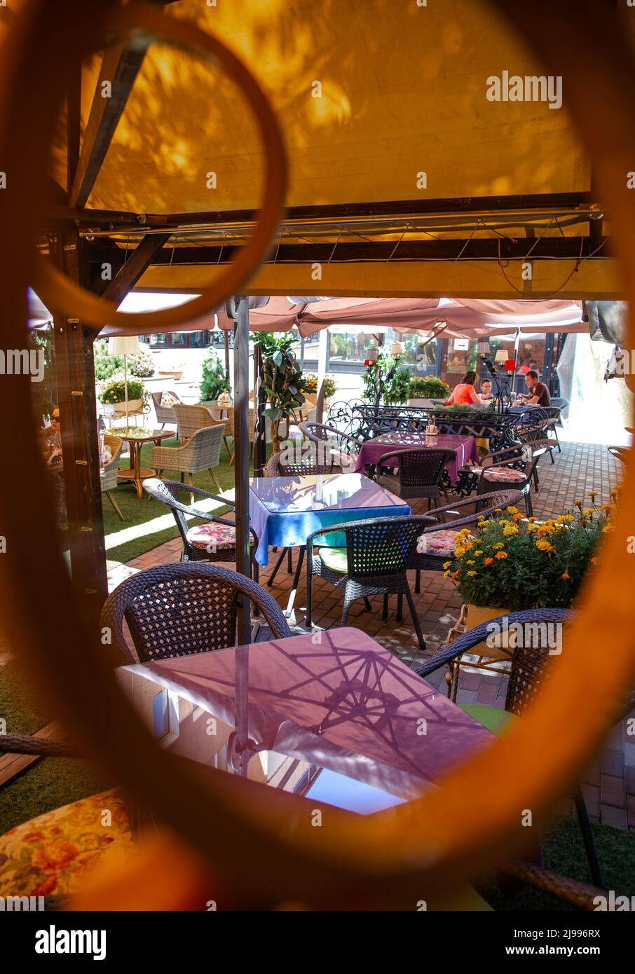 outdoor cafe with tables on a summer day Stock Photo - Alamy