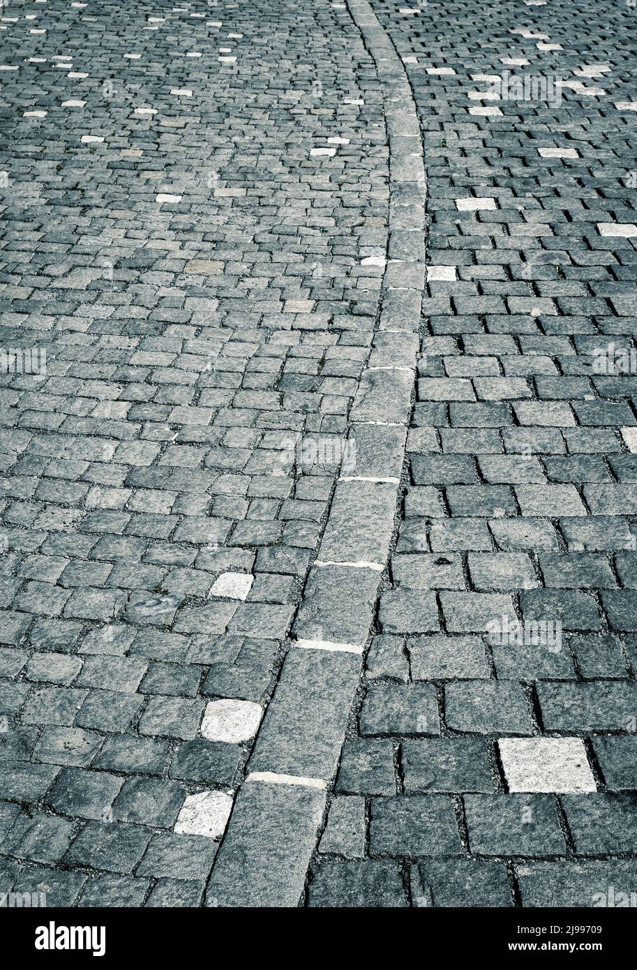 background or texture arc on stone pavement with cubes Stock Photo - Alamy