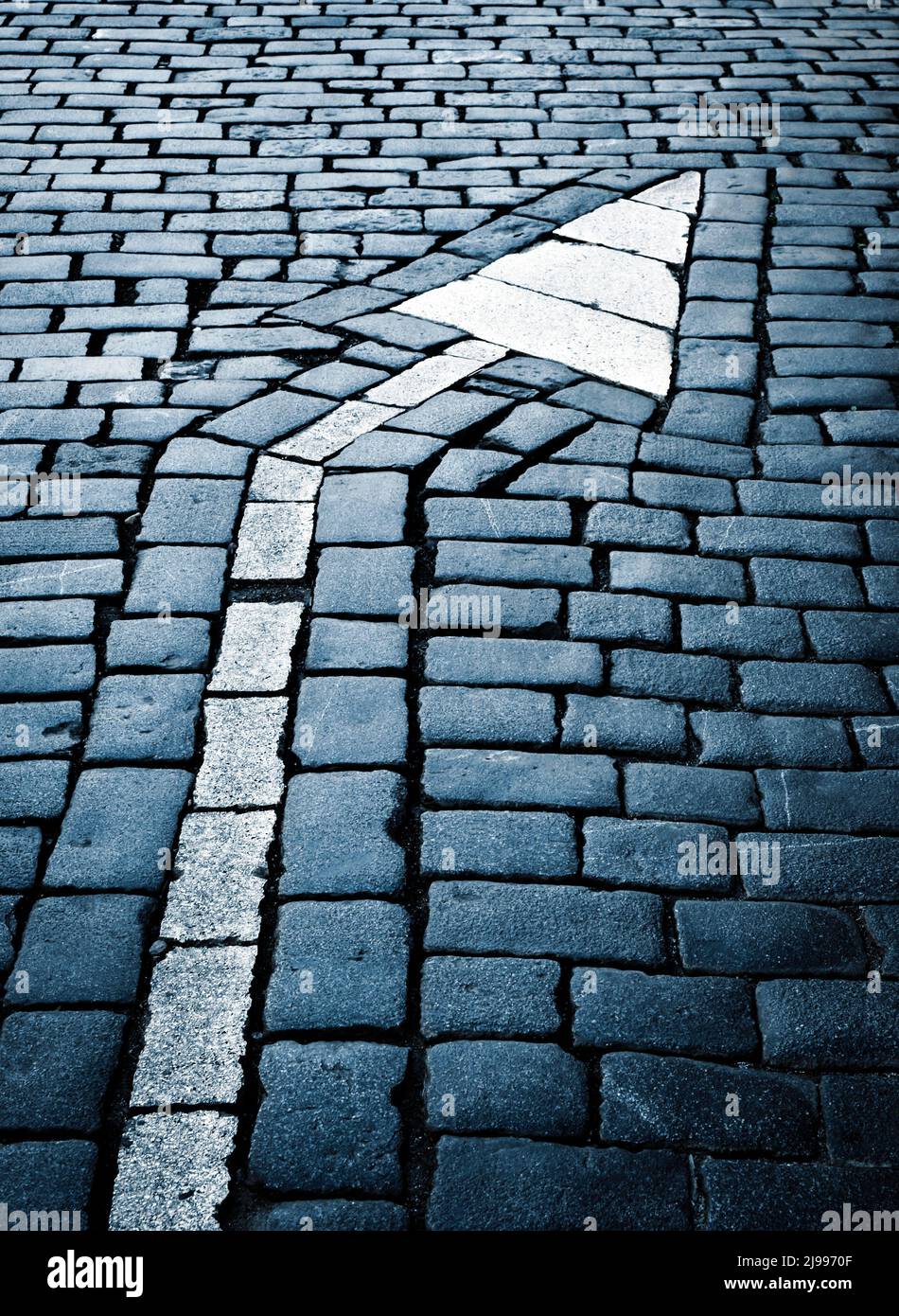 background arrow to the right on the stone path Stock Photo - Alamy
