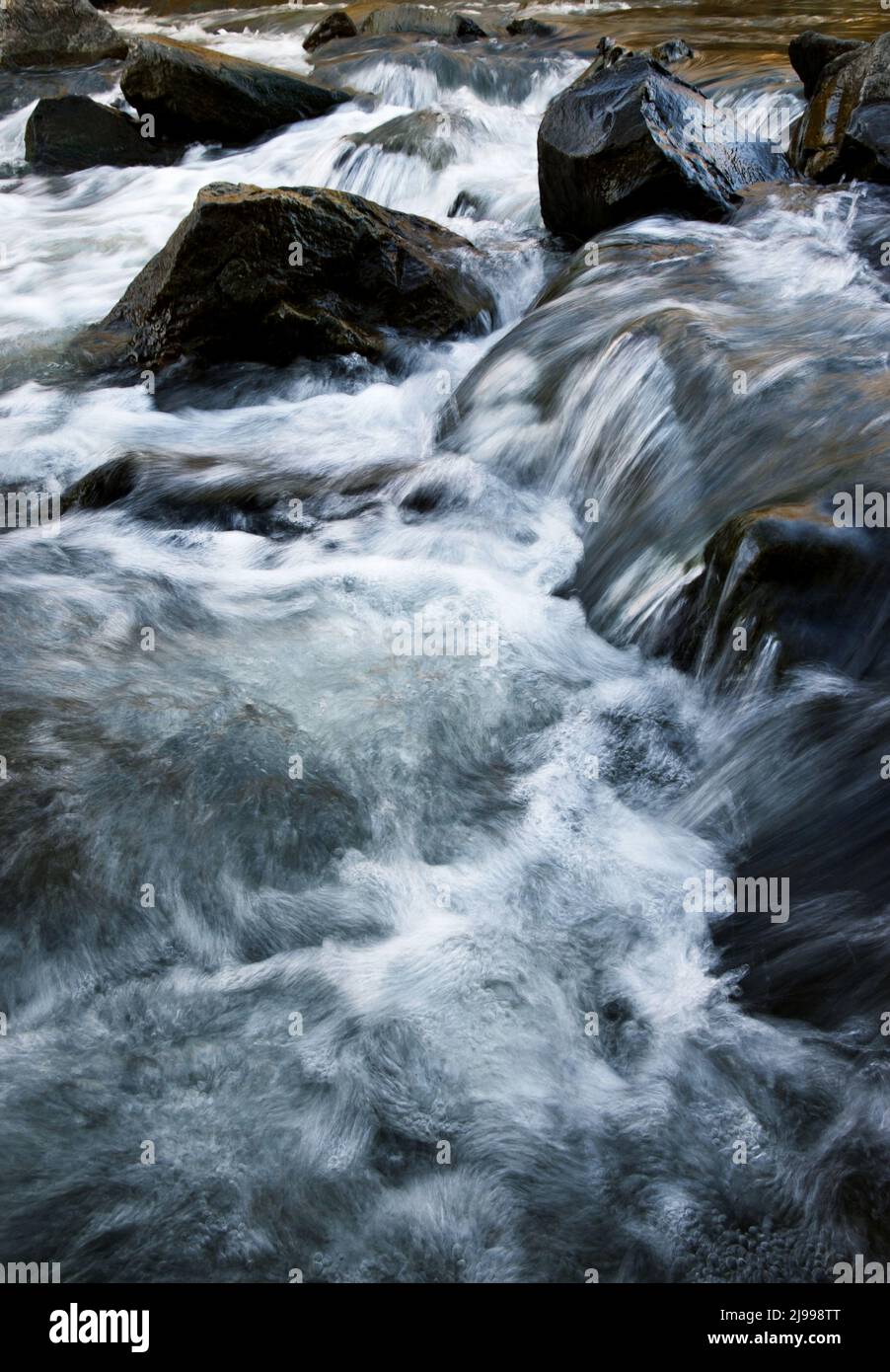 abstract nature background Dark wild river with blurred ripples Stock ...