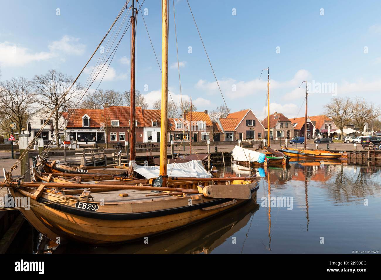 Small harbor with traditional wooden fishing boats in the picturesque ...