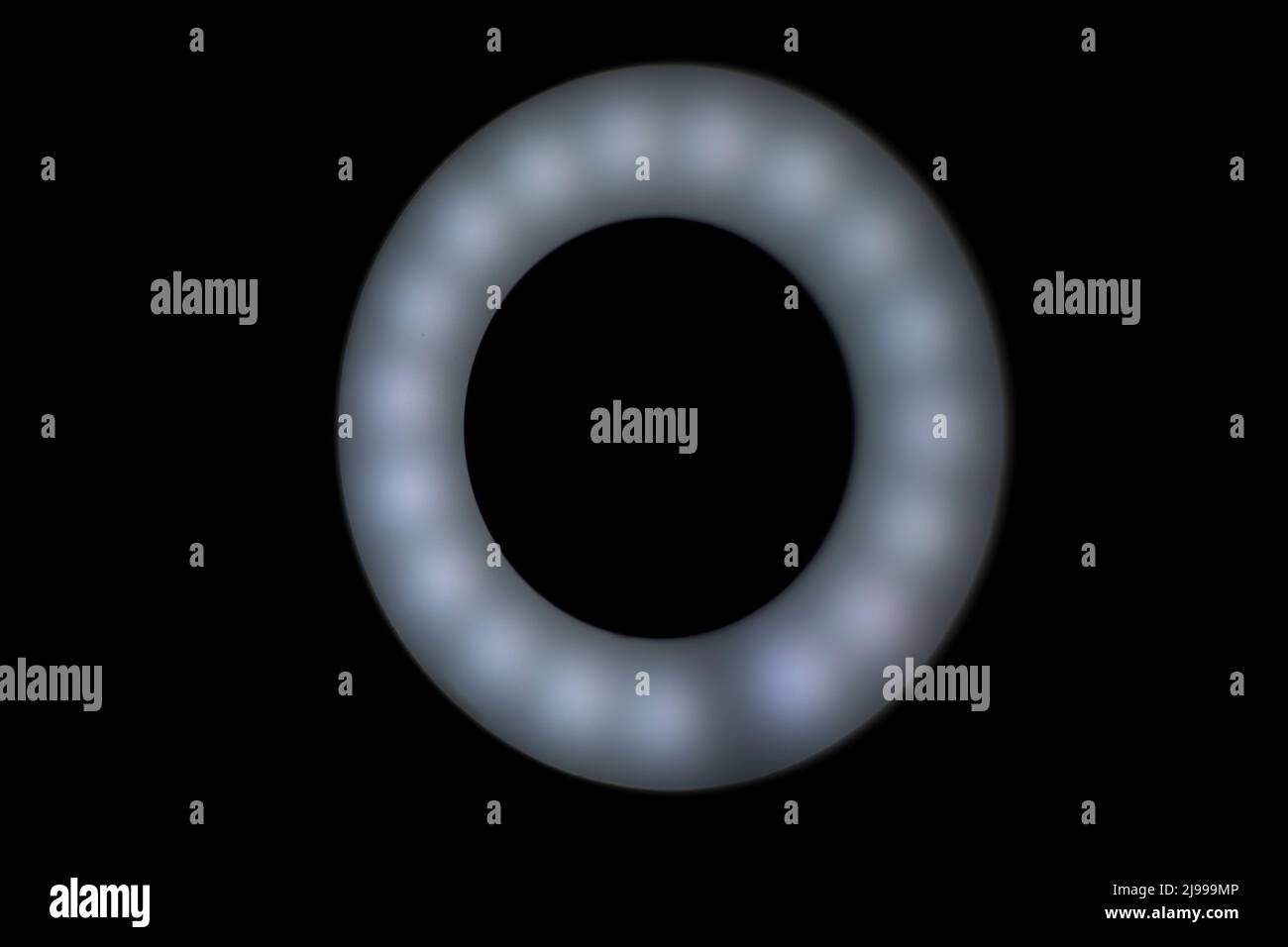 Round lamp in dark. LED light at night. Ring light source Stock Photo ...