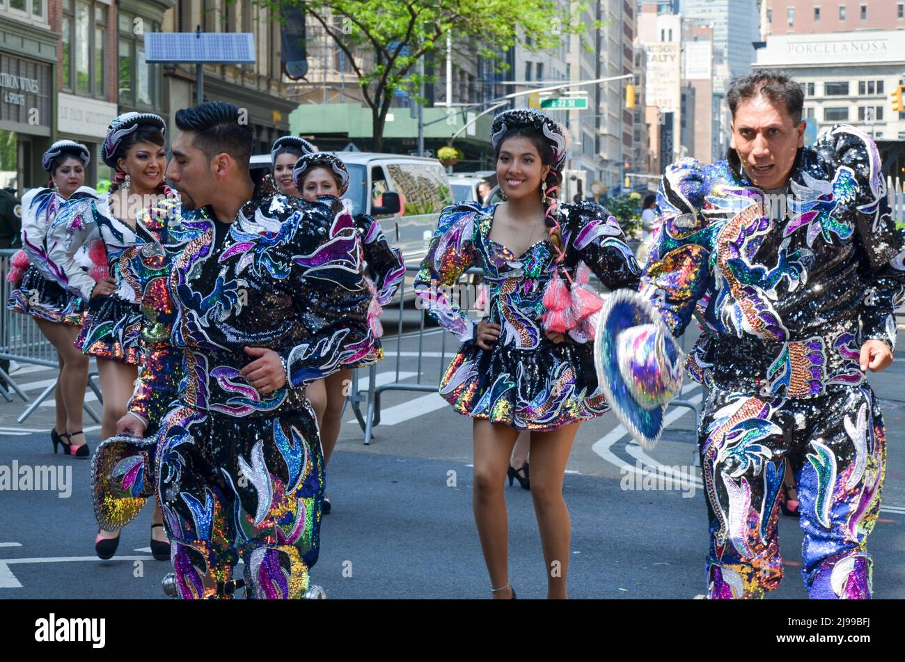 Ecuadorian dancerers dressed up in traditional costume dance their way ...