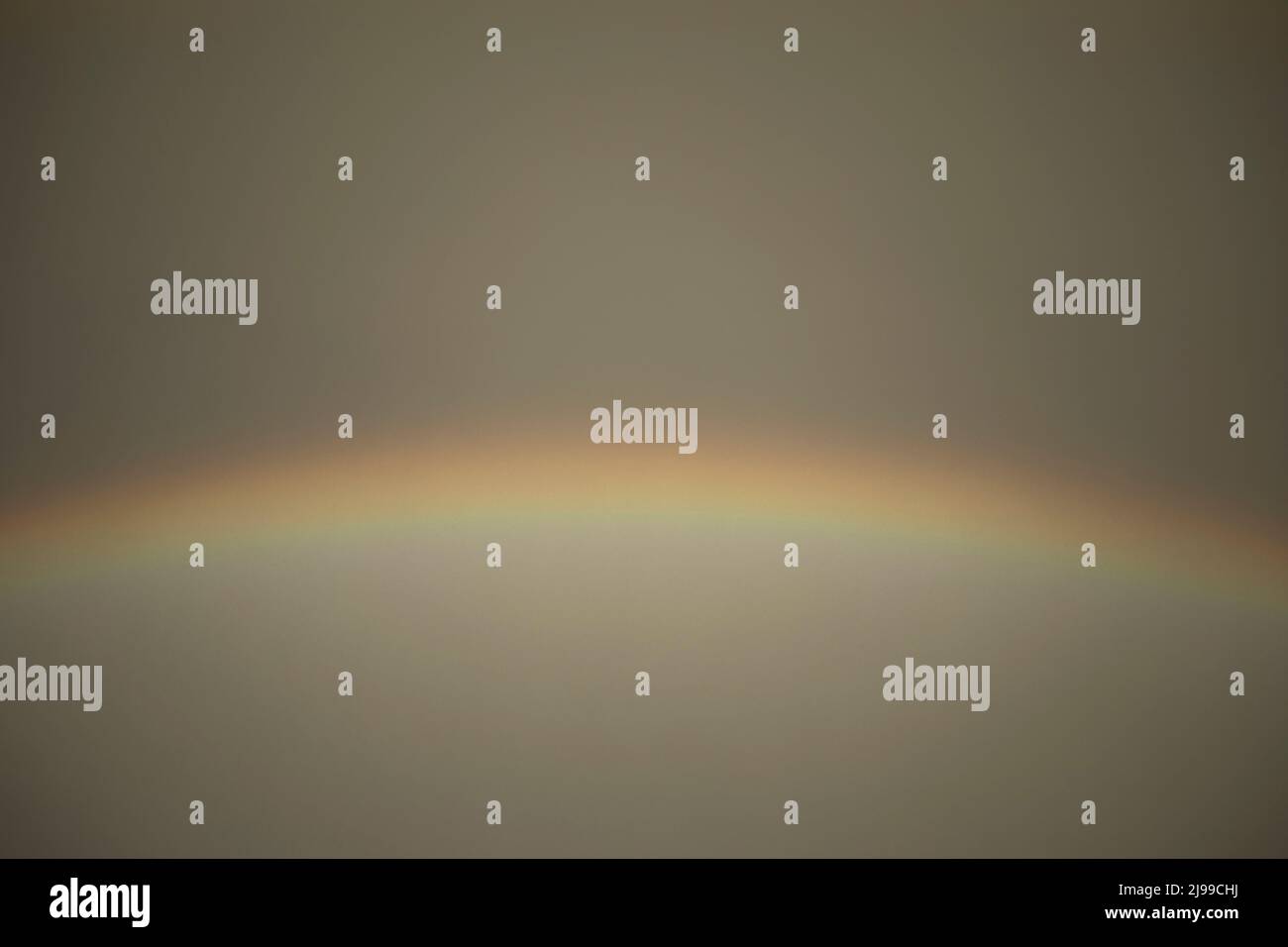 Rainbow in sky. Atmospheric phenomenon. Refraction of light. Celestial ...