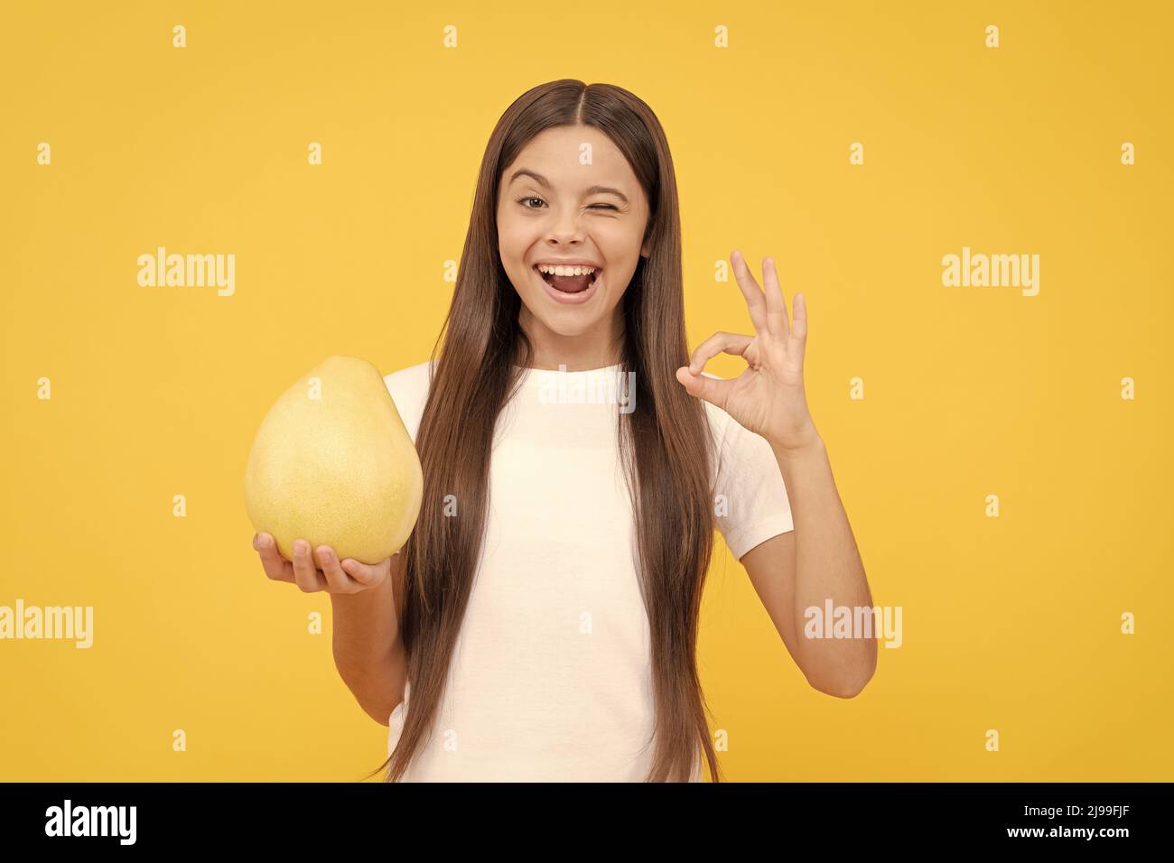 diet and kid beauty. ok. happy teen girl with pomelo citrus fruit ...