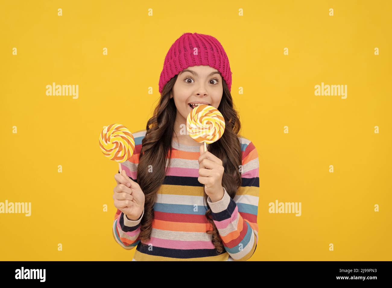 happy kid girl hold lollipop sweet, carefree Stock Photo - Alamy
