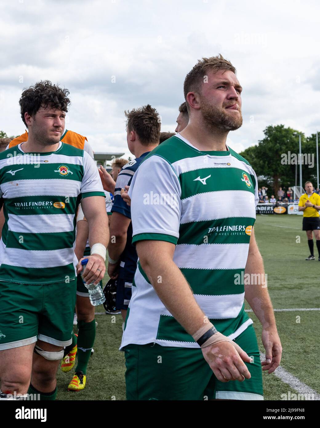 Ealing Trailfinders players walk through a tunnel formed by players ...