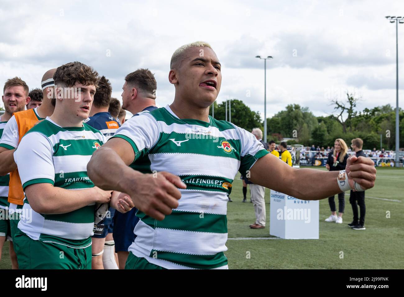 Ealing Trailfinders players walk through a tunnel formed by players ...
