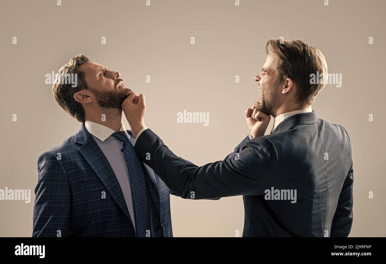 businessmen fighting and punching. boss and employee have conflict ...