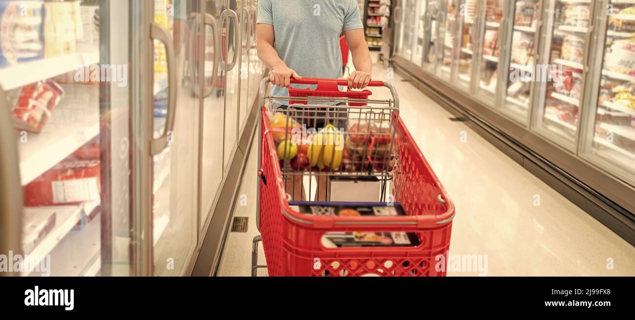 shopper at groceries. buying food at supermarket. consumption Stock ...